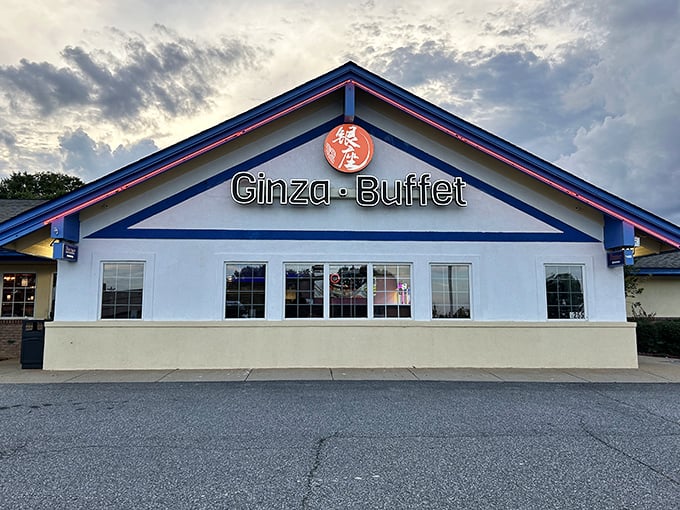 The unassuming exterior of Ginza Buffet proves once again that culinary treasures often hide behind modest facades. Blue trim and cloudy skies—a perfect prelude to comfort food.