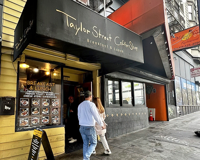 The unassuming black awning with gold lettering is like a secret handshake among San Francisco breakfast aficionados. This modest entrance hides culinary treasures within.