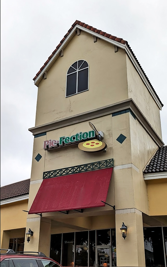 The Mediterranean-inspired tower stands like a beacon of hope for pizza lovers tired of chain restaurant mediocrity.