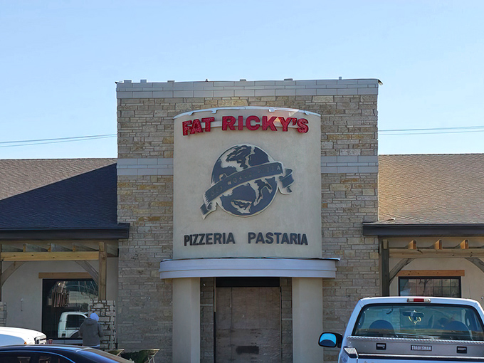 The stone facade of Fat Ricky's stands like a culinary fortress in Romeoville, promising Italian-American delights that would make any nonna proud.