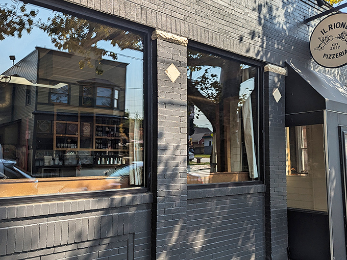The unassuming gray brick exterior of Il Rione might not stop traffic, but the aromas wafting from inside will stop you in your tracks.