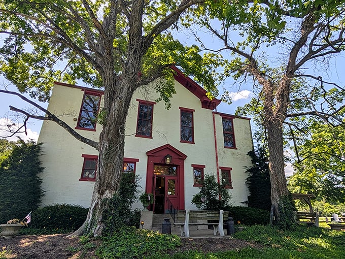 The historic white schoolhouse, accented with bold red trim, stands proudly among the trees&mdash;offering comforting lessons in homestyle cooking that&rsquo;ll have you eagerly raising your hand for seconds.