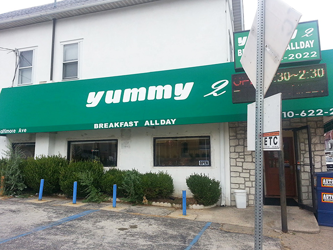 That green awning beckons like a beacon of breakfast hope along Baltimore Pike, promising comfort food awaits inside.