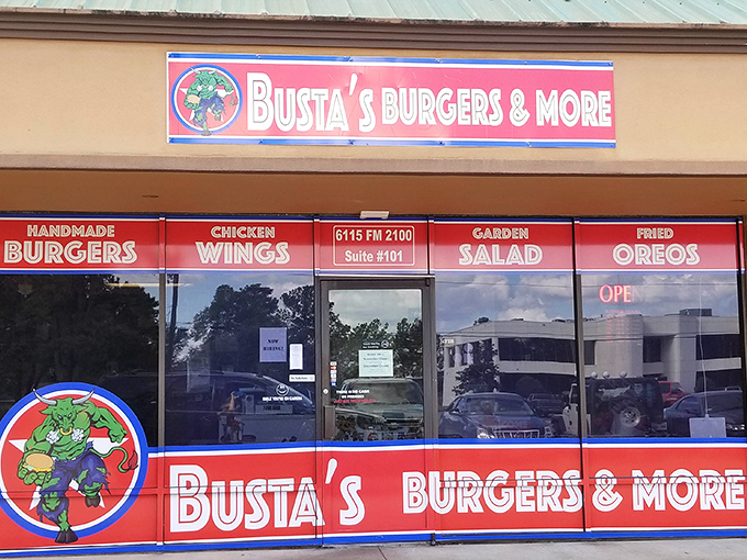 The superhero of burger joints announces itself with bold red signage and a muscular green mascot that promises heroic portions inside.
