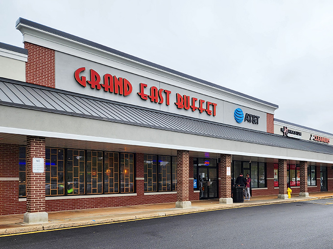 The bold red letters of Grand East Buffet beckon from this strip mall location like a lighthouse guiding hungry sailors to shore.