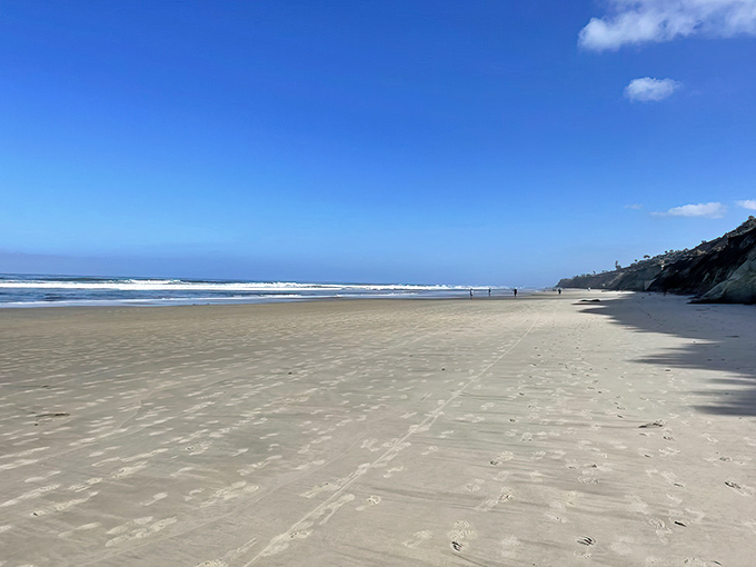 Nature's own infinity pool where the shoreline stretches so far, you'll wonder if you've accidentally wandered onto a desktop wallpaper.