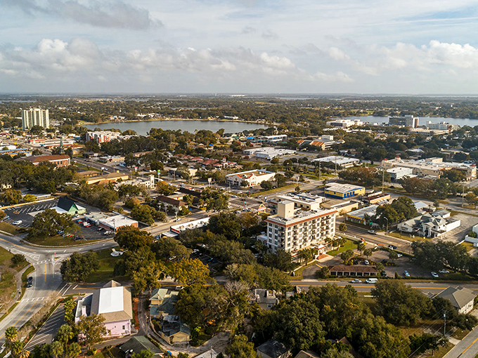 Eagle Lake unfolds like a watercolor painting from above, where small-town charm meets lakeside serenity in this affordable Florida haven.