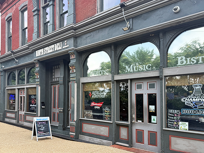 The historic fa&ccedil;ade of Ninth Street Deli beckons like an old friend, its arched windows and brick exterior promising culinary treasures within St. Louis's vibrant food scene.