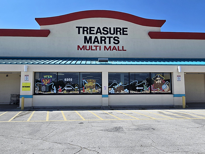 The iconic red-trimmed facade of Treasure Marts beckons bargain hunters like a siren call to the wallet-conscious adventurer.