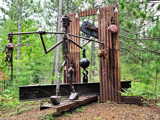 The "United Steelworkers" sculpture stands as a testament to industrial creativity, where discarded metal finds new purpose among the pines of Michigan's Upper Peninsula.
