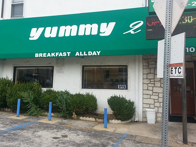 The bright green awning of yummy2 stands as a beacon of breakfast hope on an otherwise ordinary Clifton Heights street corner.