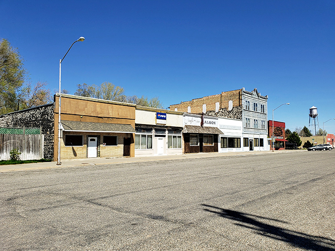Main Street Shoshone &ndash; where time slows down and historic buildings stand proudly against that impossibly blue Idaho sky, like sentinels guarding small-town tranquility.