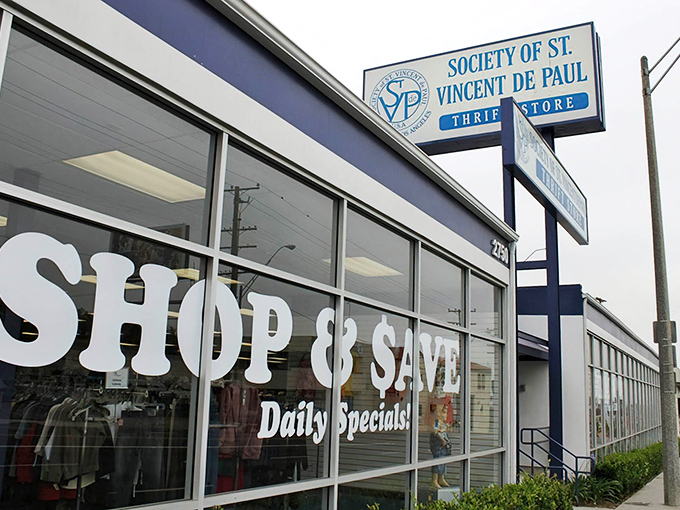 The iconic blue and white storefront promises treasures within, where "SHOP & SAVE" isn't just a slogan&mdash;it's a lifestyle commitment.
