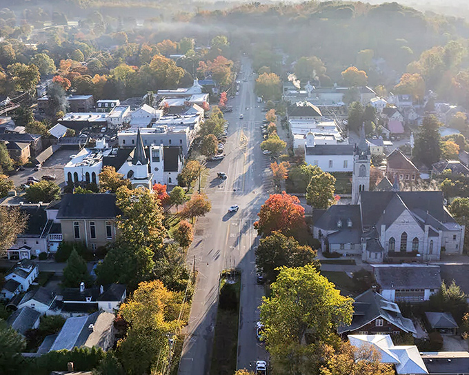 Morning mist embraces Granville's historic main street, where New England charm somehow found its way to Ohio and decided to stay forever.