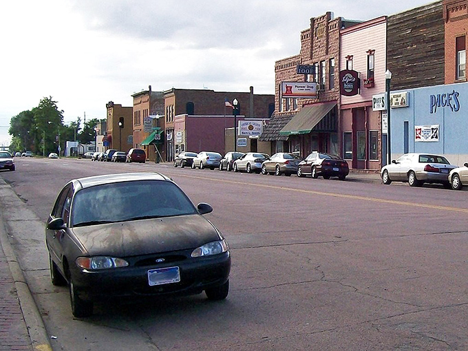Main Street magic in Elk Point, where time slows down but conversations speed up. Classic brick buildings stand like sentinels of small-town charm.