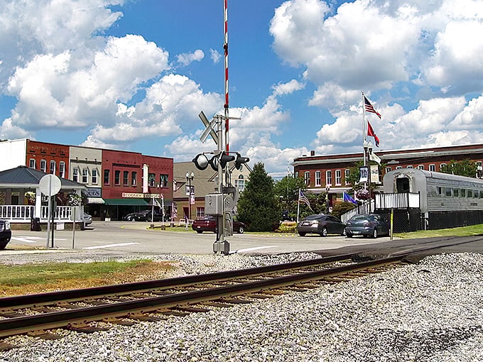 The vintage silver railcar stands sentinel over Sweetwater's historic downtown, a gleaming reminder of the town's railroad roots.