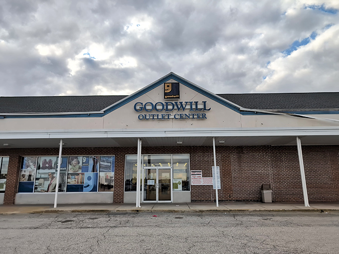 The unassuming exterior of Goodwill Outlet Center &ndash; where treasure hunting begins and wallets breathe sighs of relief.