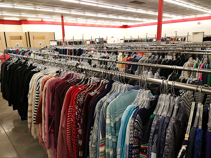 Rows upon rows of clothing create a textile rainbow, where yesterday's fashion finds new life and shoppers discover their next favorite outfit.