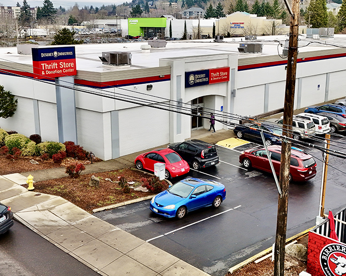 The unassuming exterior of Deseret Industries in Happy Valley hides a treasure trove within. Like all great adventures, this one begins with a simple doorway.
