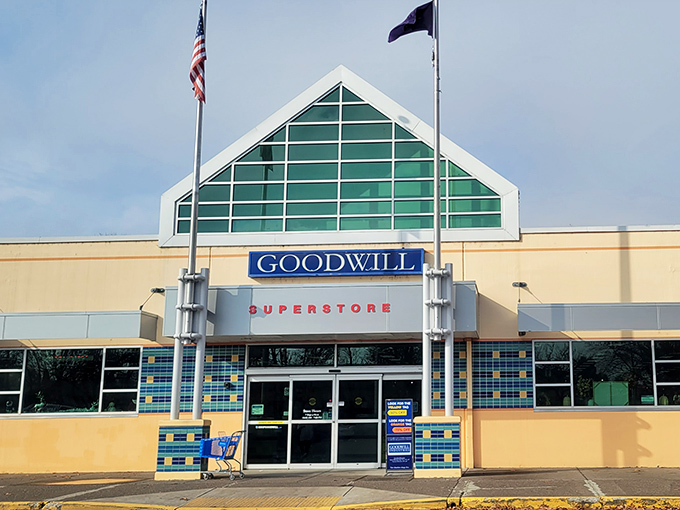 The superstore facade practically shouts "bargain hunters welcome" with its cheerful blue and yellow exterior design.