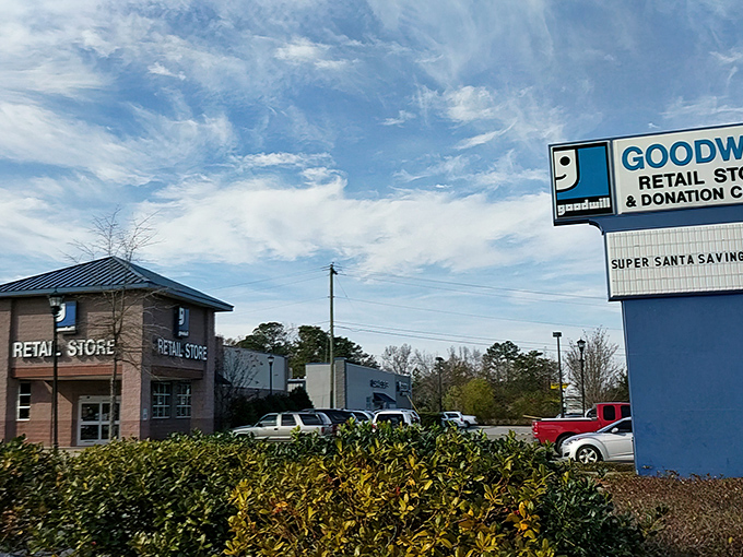 The brick facade of Palmetto Goodwill stands like a retail promised land under Carolina blue skies, beckoning bargain hunters from across the state.