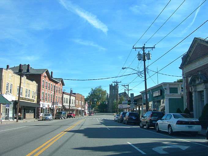 Downtown Thomaston on a perfect blue-sky day, with the church steeple standing tall like the town's unofficial timekeeper.