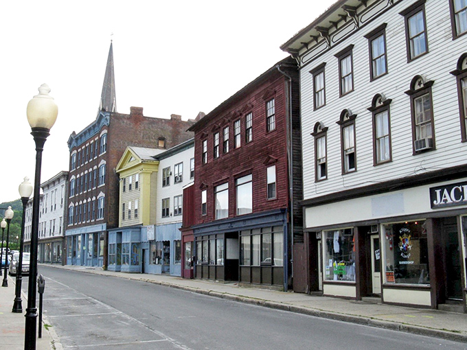 Historic charm meets small-town affordability on North Adams' main street, where colorful facades tell stories of reinvention and possibility.