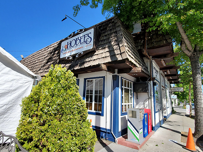 Hobee's rustic wooden-shingled exterior stands like a cozy cabin amid Silicon Valley's tech landscape, promising comfort food and conversation rather than algorithms and apps.