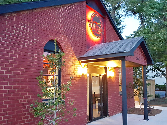 The bright red exterior of Southern Roots Smokehouse stands out like a beacon for barbecue pilgrims. Simple, unpretentious, and promising delicious things inside.