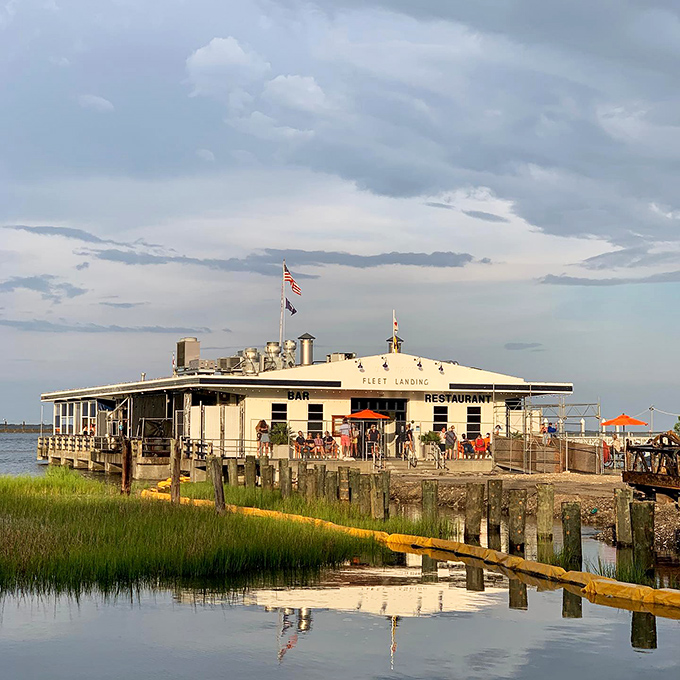 Fleet Landing stands like a culinary lighthouse on Charleston's waterfront, beckoning hungry travelers with its historic naval charm and promise of seafood treasures.