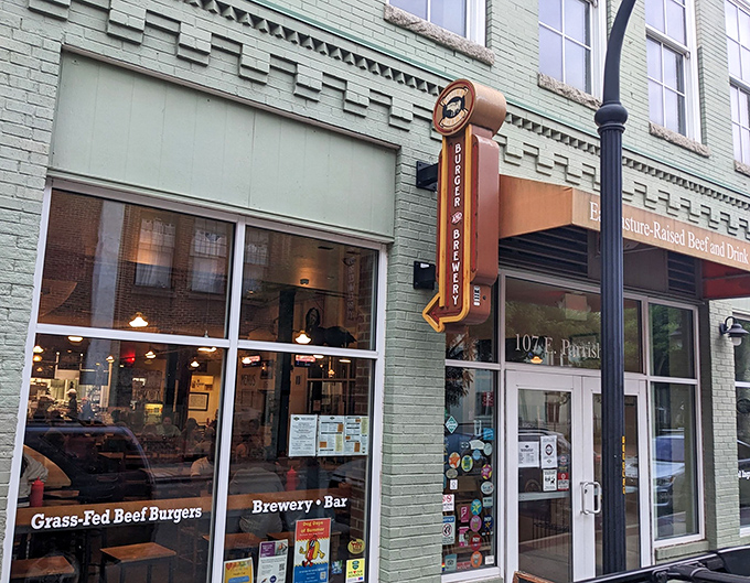 The mint-green facade of Bull City Burger and Brewery stands as Durham's beacon of burger brilliance, with its vintage-style sign promising delicious adventures within.