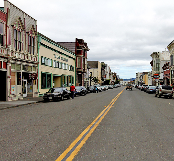 Main Street Ferndale, where Victorian architecture isn't just preserved&mdash;it's living its best life. The Valley Grocery looks ready to sell you penny candy and life advice in equal measure.