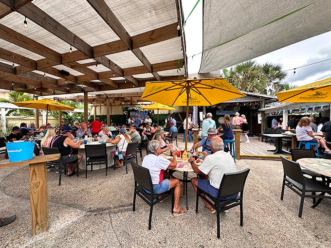 The yellow facade of Pop's Sunset Grill might not scream "culinary destination," but locals know this unassuming exterior hides seafood treasures within.