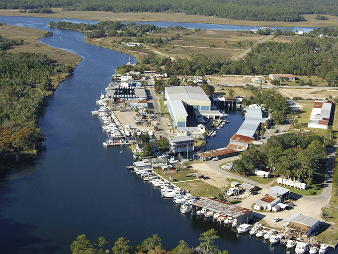 Where boats outnumber people and nobody's complaining. This working waterfront maintains the authentic charm that fancy marinas try desperately to manufacture.