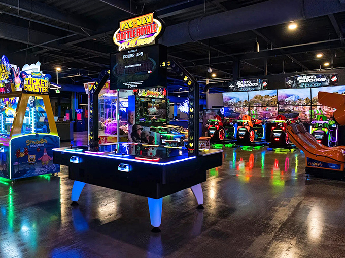 Neon dreams come alive at Elev8 Fun's arcade, where air hockey battles are waged under the glow of colorful lights that would make Vegas jealous.