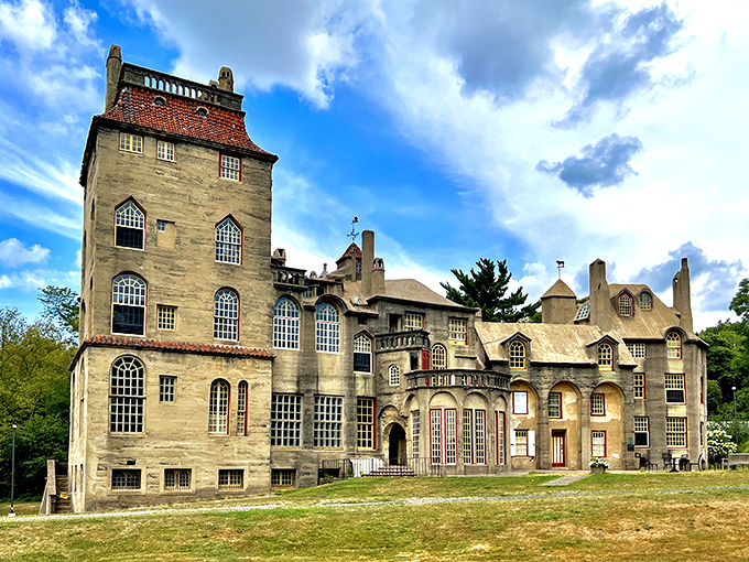 Fonthill Castle stands like a concrete fever dream against the Pennsylvania sky, where medieval fantasy meets early 20th-century innovation.