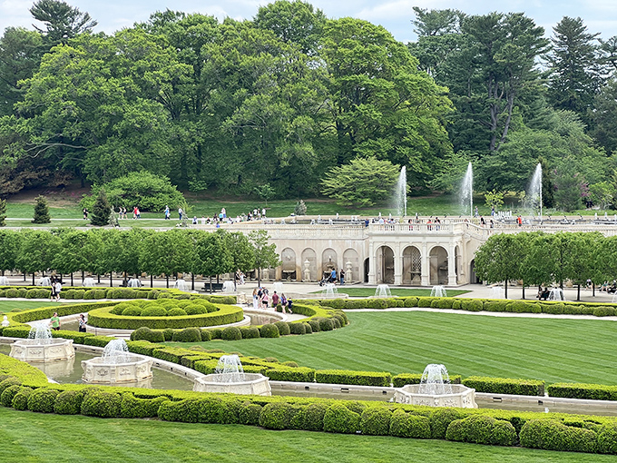 The grand Main Fountain Garden unfolds like nature's theater&mdash;meticulously manicured hedges frame dancing waters while stately architecture stands guard in the background.