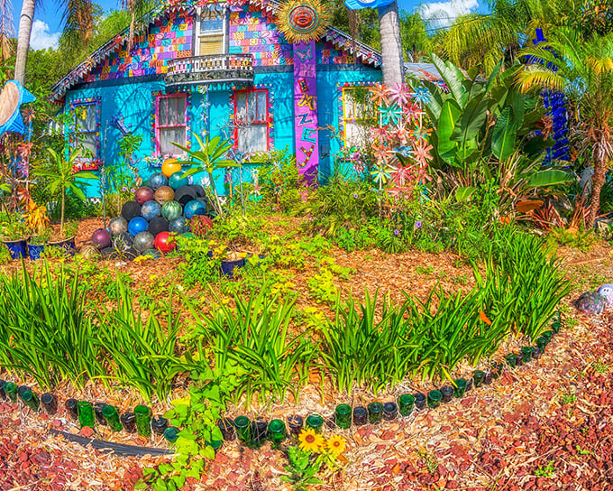 The main house at Whimzeyland explodes with color like a rainbow that decided to settle down and become real estate. Florida's answer to Oz.