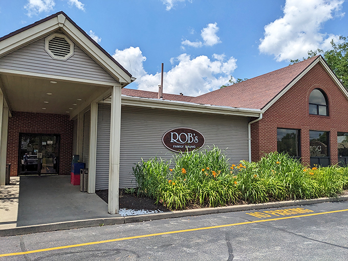 Rob's welcoming exterior combines brick charm with lush landscaping, creating that "I've just discovered something special" feeling as you pull in.
