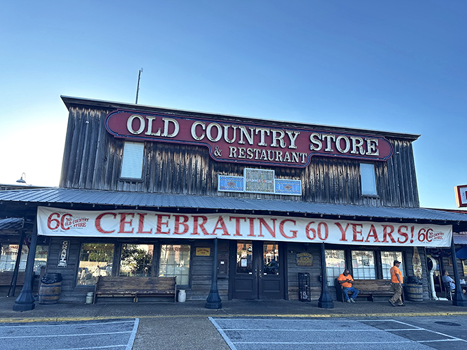 The weathered wooden facade of Brooks Shaw's Old Country Store stands like a time capsule, promising Southern comfort food treasures within its rustic walls. Photo credit: Ryan French