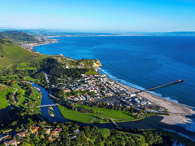 Aerial dreams come true! Avila Beach unfolds like a perfect postcard, where the horseshoe bay cradles a town that somehow escaped Southern California's tourist stampede.