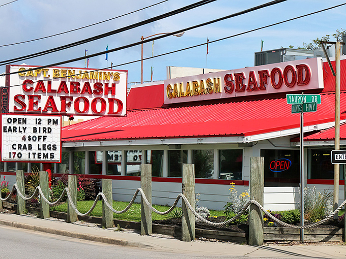 The iconic red signage of Captain Benjamin's promises seafood treasures within. Like a lighthouse for hungry sailors, it beckons with promises of crab legs and 170 delectable items.