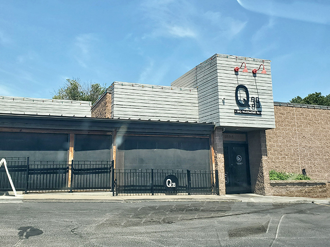 The modern exterior of Q39 stands as a beacon of barbecue hope in Kansas City's Midtown, promising smoky delights within those brick walls.