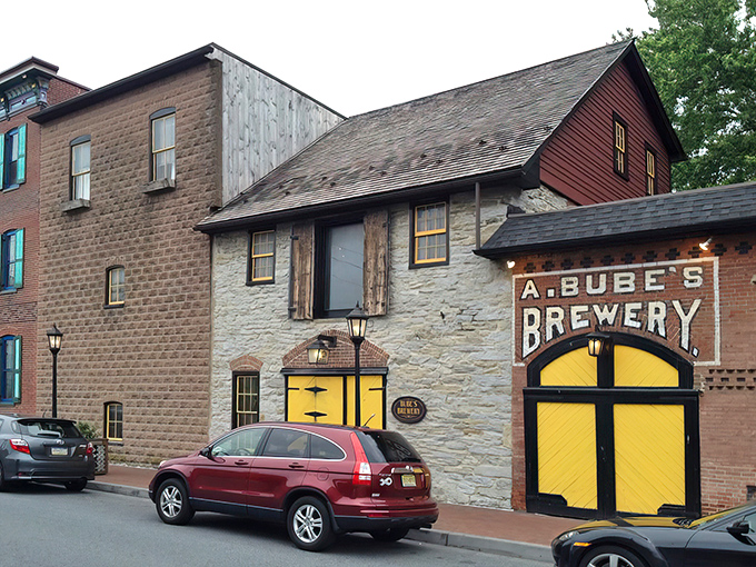 The iconic fa&ccedil;ade of Bube's Brewery stands proudly on Mount Joy's main street, its yellow doors like a beacon calling hungry travelers home.