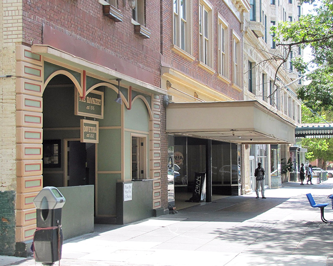 The Rookery's historic brick fa&ccedil;ade on Cherry Street invites you in with a promise of Southern comfort and burger perfection waiting just beyond those mint-green doors.