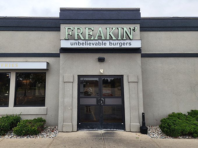 The unassuming exterior of Freakin' Unbelievable Burgers hides culinary treasures within, like finding a diamond in a strip mall setting.