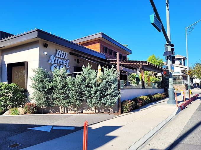 The Hill Street Cafe stands proudly on Foothill Boulevard, its warm earth tones and inviting patio beckoning hungry travelers like a culinary lighthouse in La Cañada Flintridge.