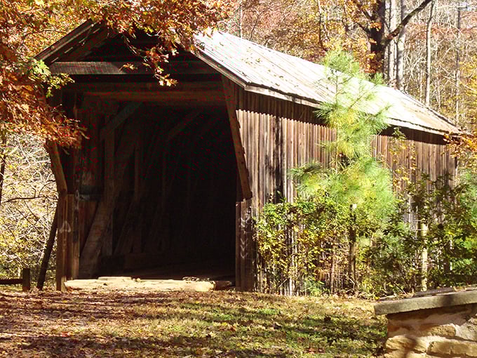 Like a wooden time machine waiting for you to step inside, the Historic Bunker Hill Covered Bridge stands proudly amid autumn's fiery display.