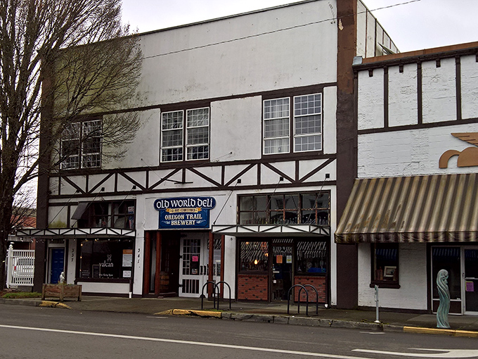 A street view that reveals the architectural character of Old World Deli, where the half-timbered exterior hints at the culinary treasures waiting inside.