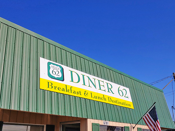 The green exterior of Diner 62 stands like a beacon of breakfast hope along Highway 99, promising comfort food salvation to hungry travelers.